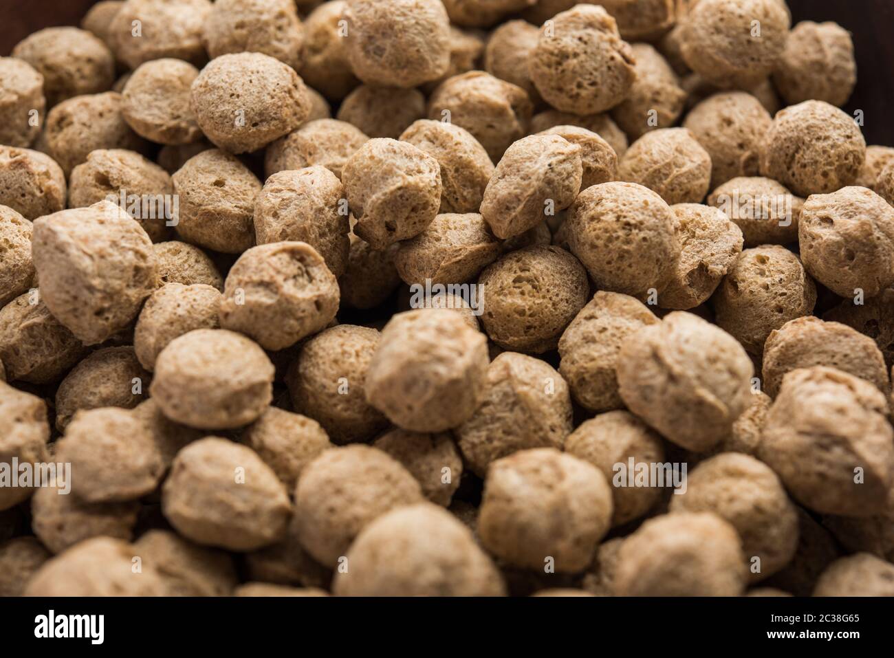 Raw Soya Chunks, Soy Meat for vegans isolated on colourful background ...