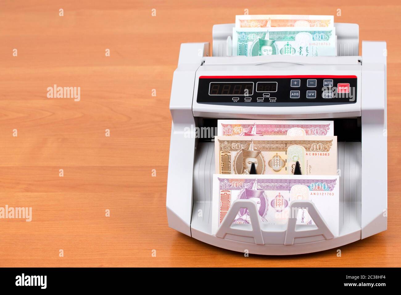 Mongolian Tugrik in a counting machine Stock Photo - Alamy