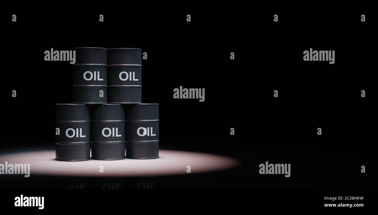 Stack of Black Oil Barrels Spotlighted on Black Background with Copy ...