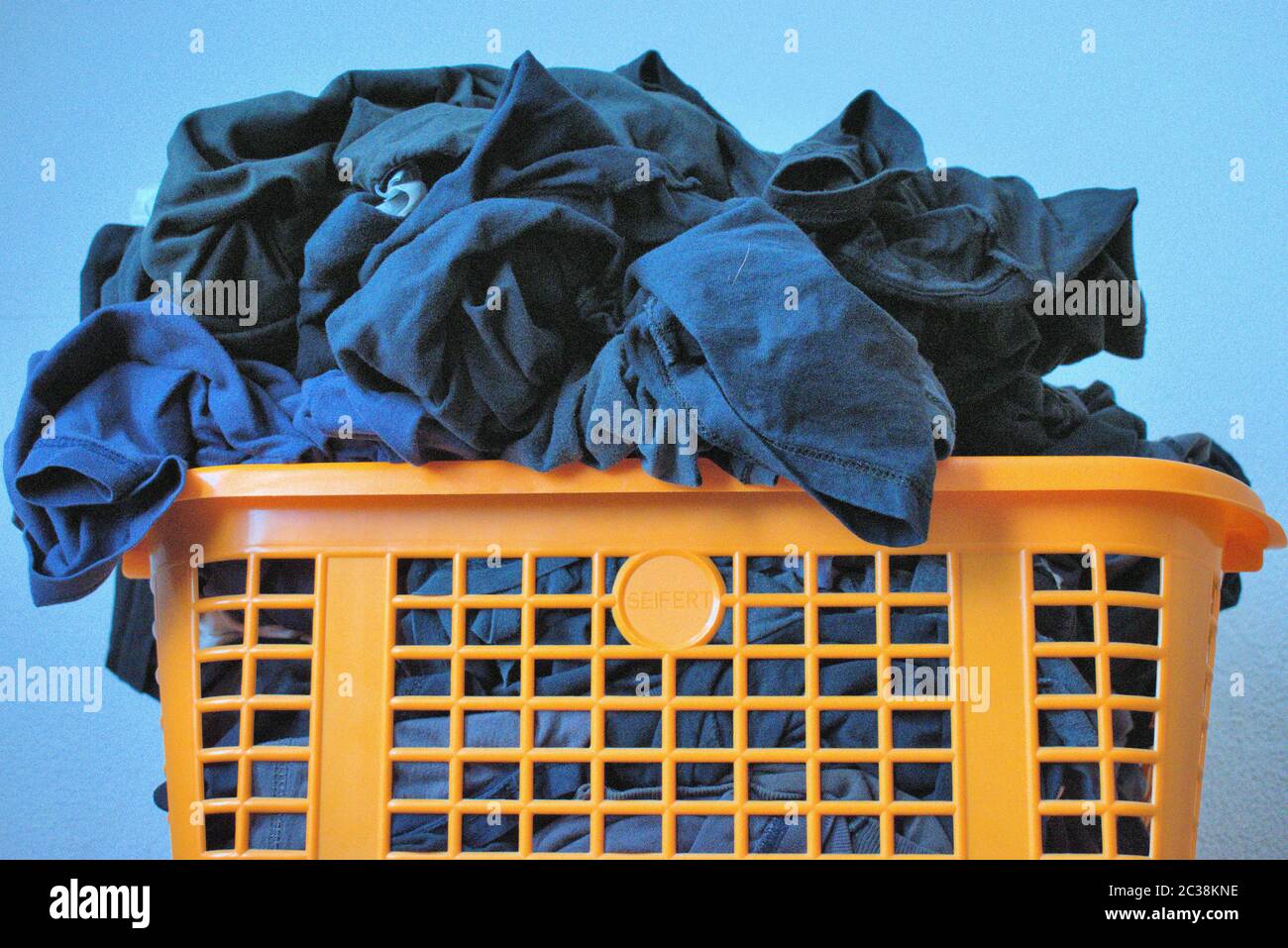 Pile of shirts home hi-res stock photography and images - Alamy