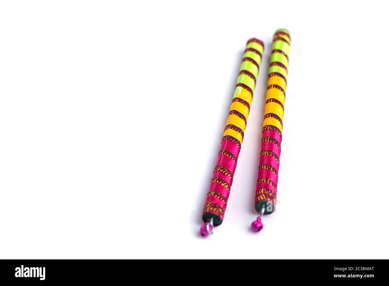 Dandiya sticks on a white background. Raas Garba or Dandiya Raas is the ...