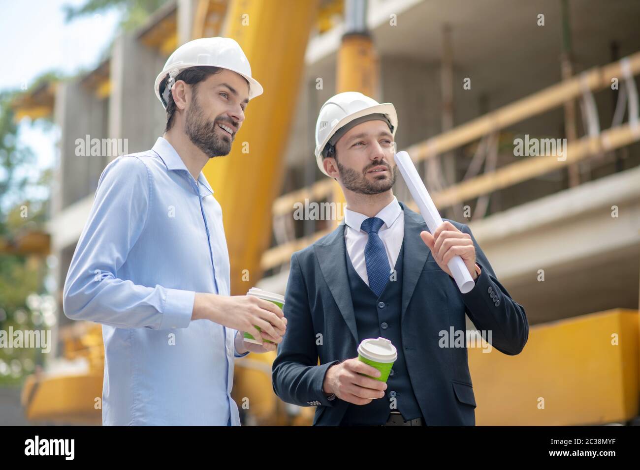 Construction drinking coffee construction site hi-res stock photography ...