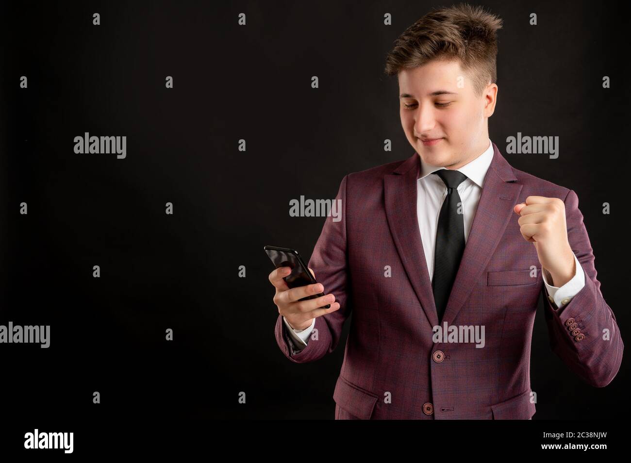 Law student with blond hair dressed in burgundy jacket, white shirt and ...