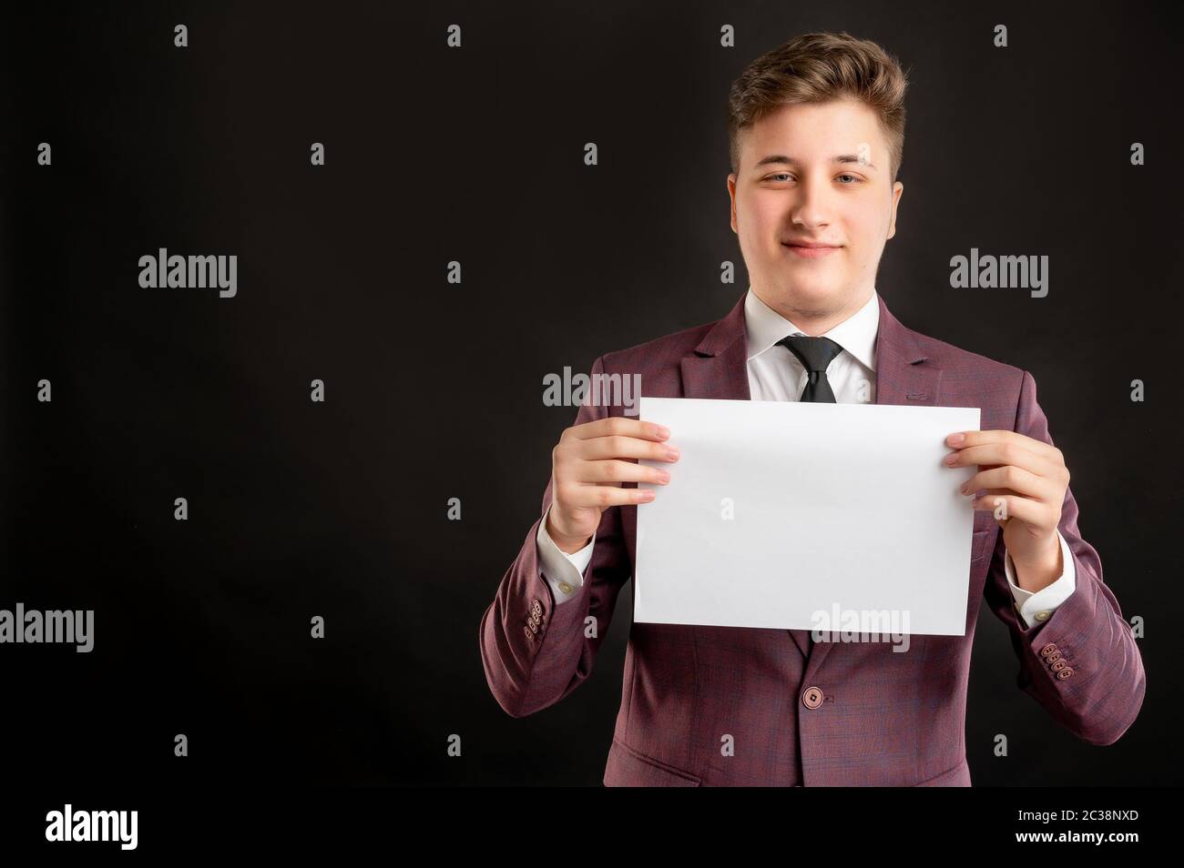 Law student with blond hair dressed in burgundy jacket, white shirt and ...