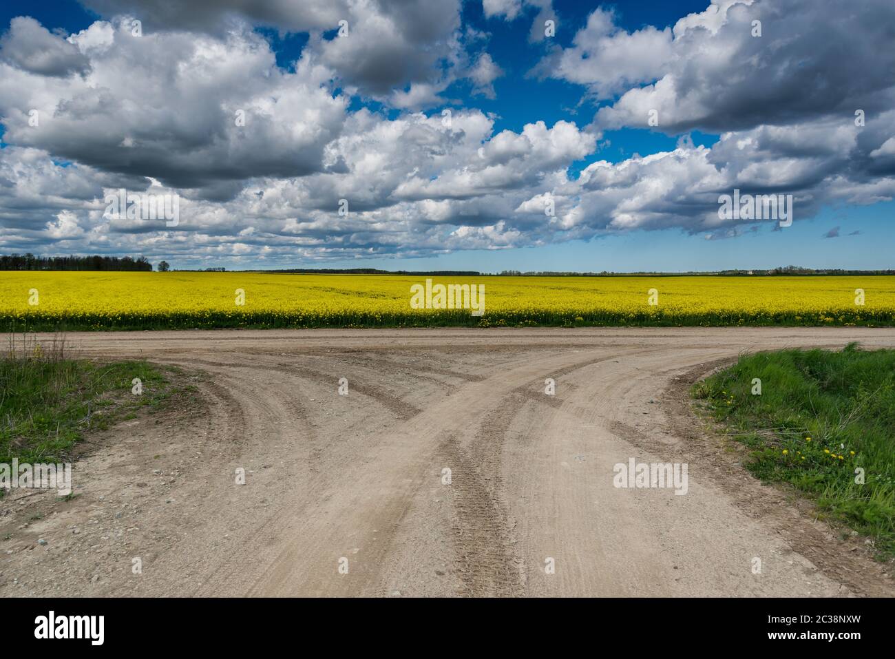 View to crossroad in countryside Stock Photo - Alamy