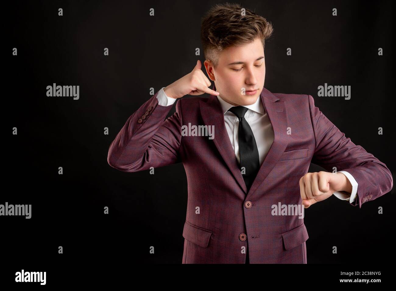 Law student with blond hair dressed in burgundy jacket, white shirt and ...