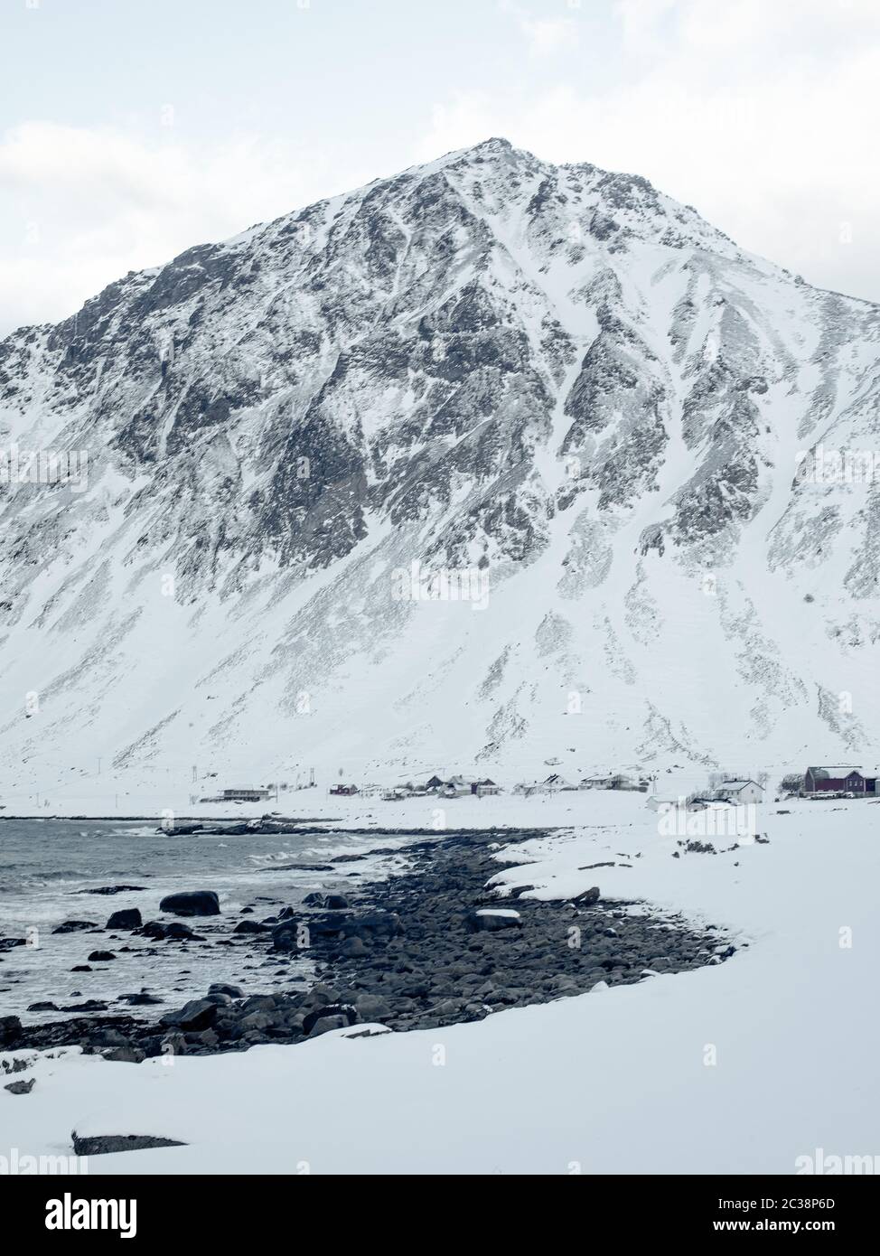 A portrait shot of a snowy arctic surf beach Stock Photo - Alamy