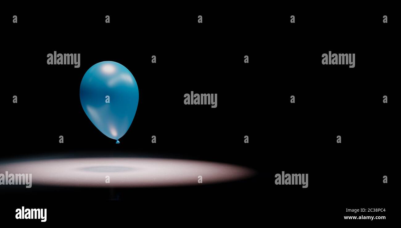 One Single Blue Balloon Spotlighted on Black Background with Copy Space ...