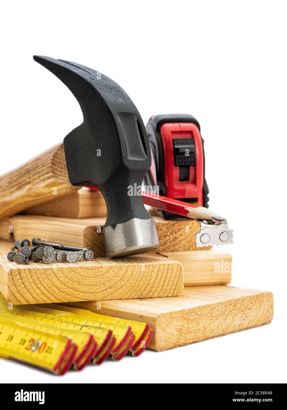 Close-up of hammer and carpenter's tools on a white background ...