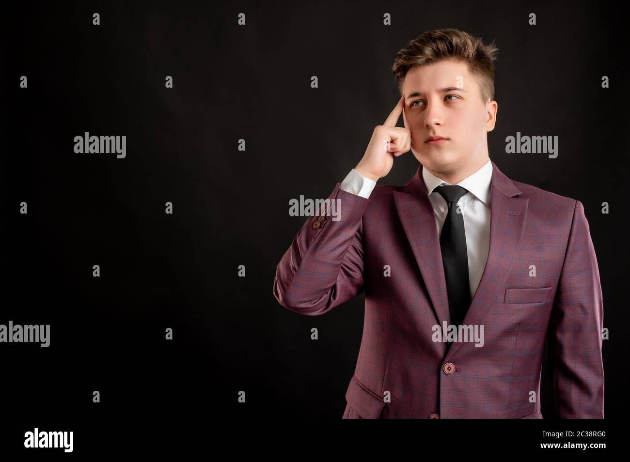Law student with blond hair dressed in burgundy jacket, white shirt and ...