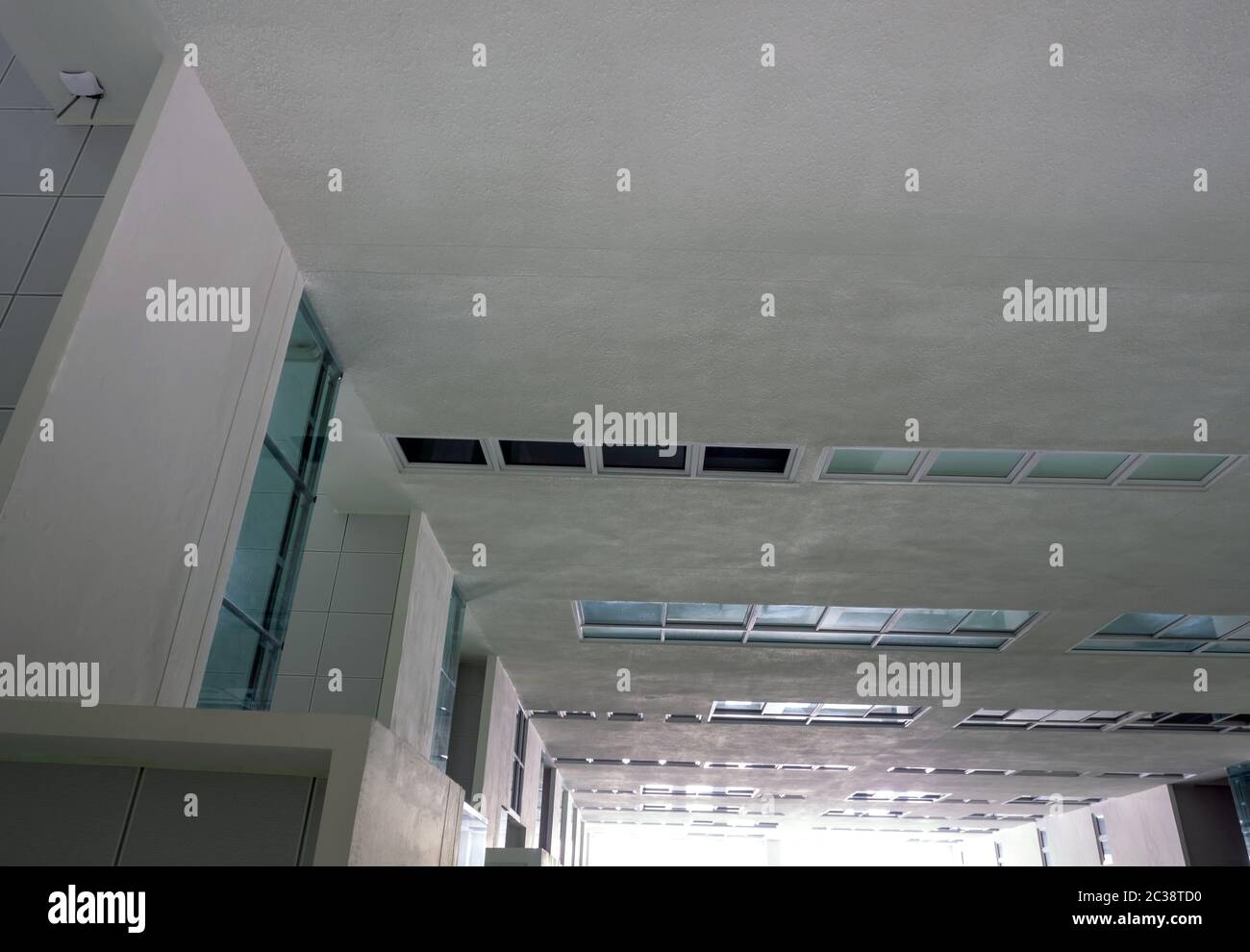 A Low vantage point in hall the high rise building, Looking up to the ...