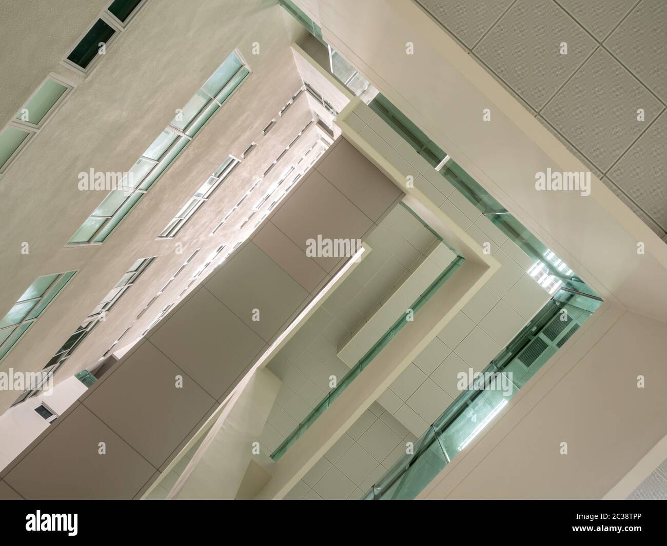 A Low vantage point in hall the high rise building, Looking up to the ...