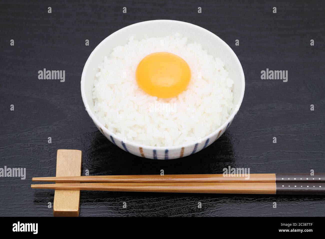 Japanese cooked rice with raw egg, Tamago kake gohan Stock Photo - Alamy