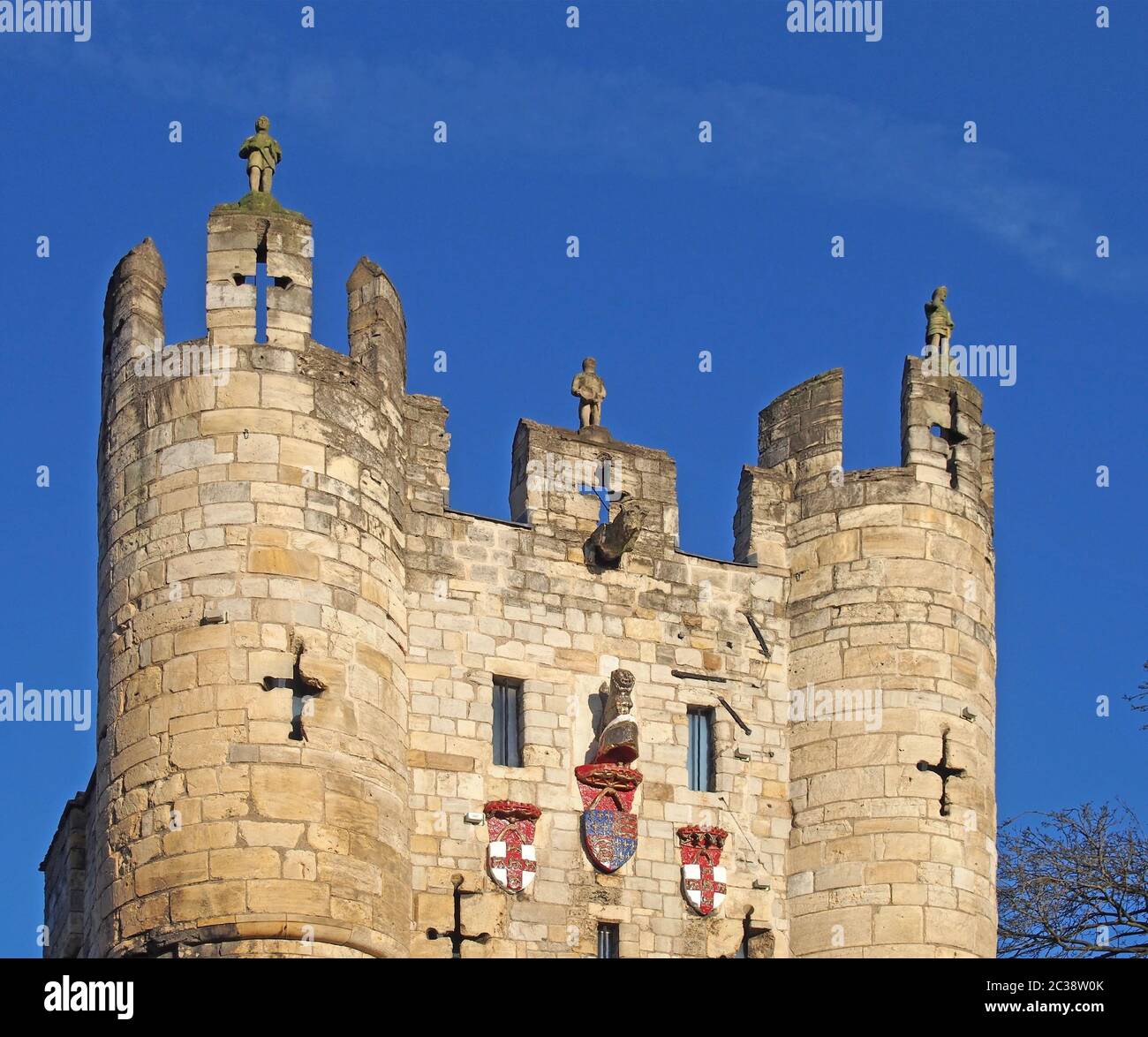 a close up of the top of Micklegate Bar the 12 century gatehouse and ...