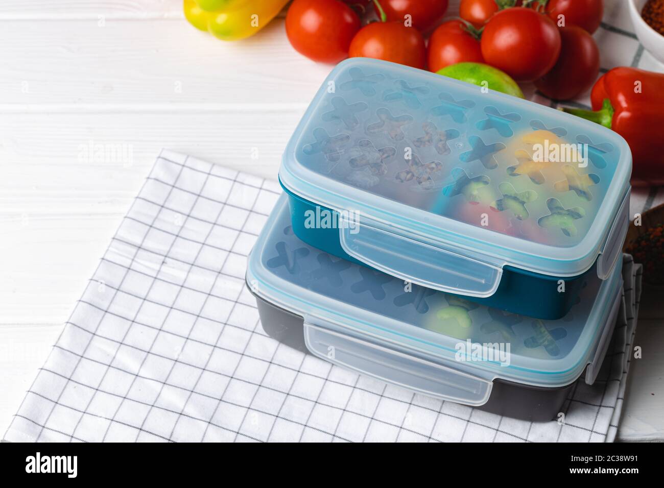 Closed plastic lunch box on kitchen table Stock Photo - Alamy
