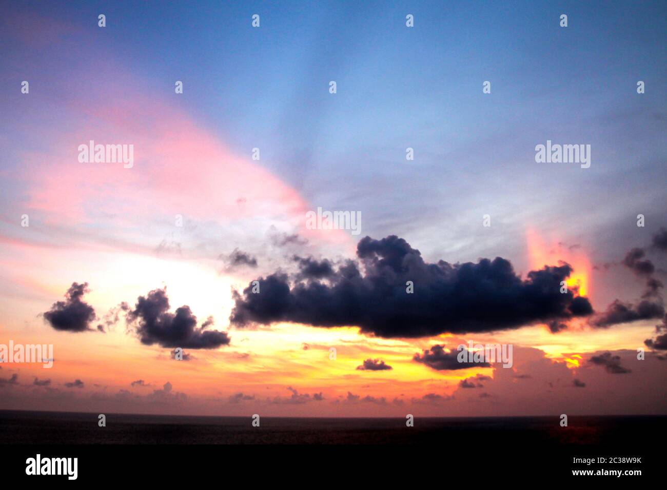 Dramatic Sunset Sky with Clouds Stock Photo - Alamy