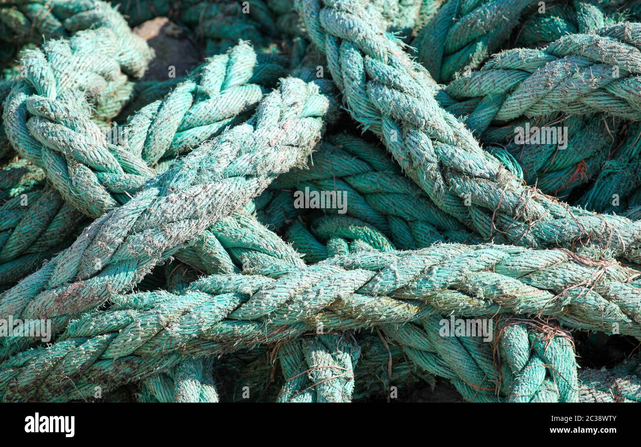 Thick coiled old rope hi-res stock photography and images - Alamy