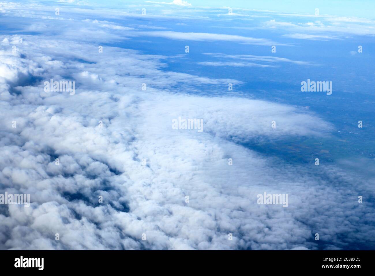 Sky and clouds from airplane window Stock Photo - Alamy