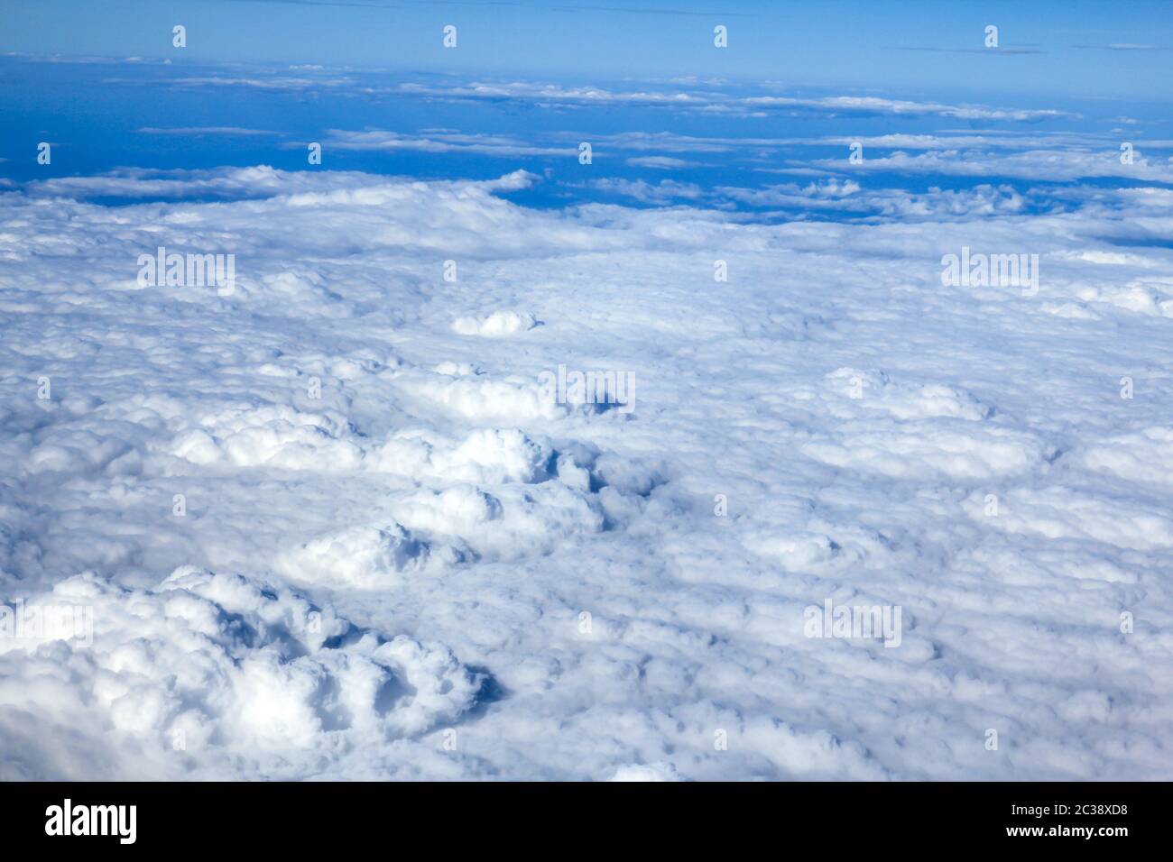 Sky and clouds from airplane window Stock Photo - Alamy