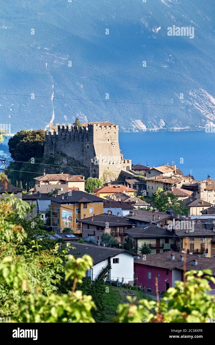 The medieval castle and the ancient village of Tenno. In the background ...