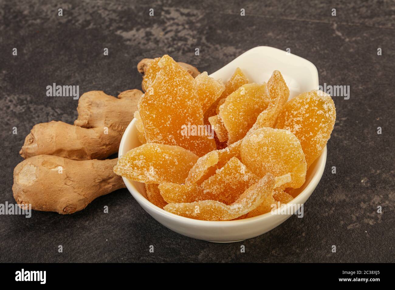 Dry sweet ginger snack in the bowl Stock Photo - Alamy