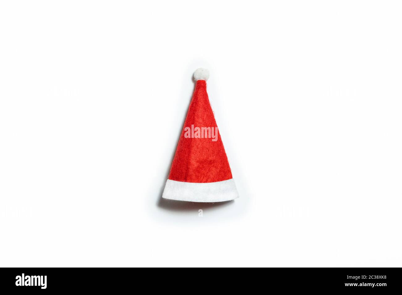 Santa Claus red hat isolated on white background Stock Photo - Alamy