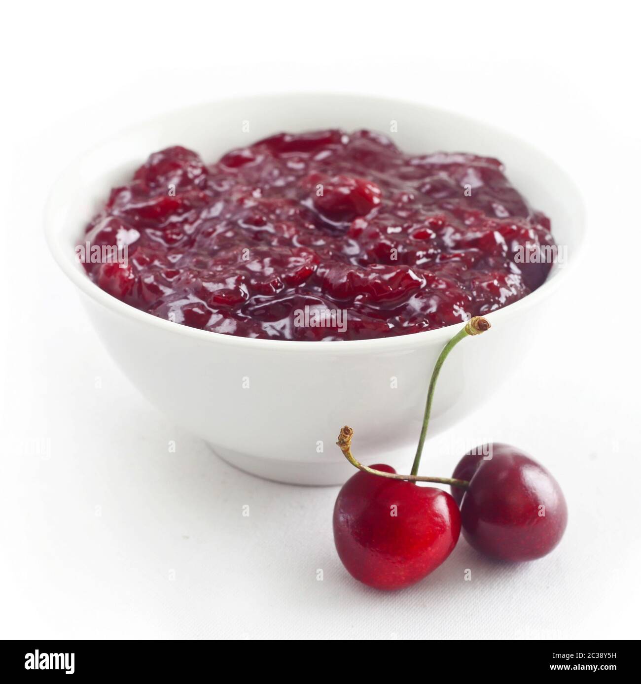 Cherry Jam On A White Background Stock Photo - Alamy