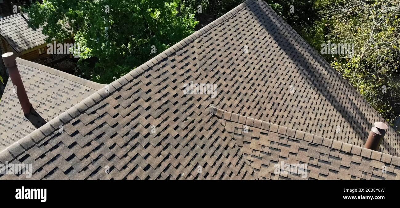 Bituminous tile for a roof. a roof from a bituminous tile Stock Photo ...