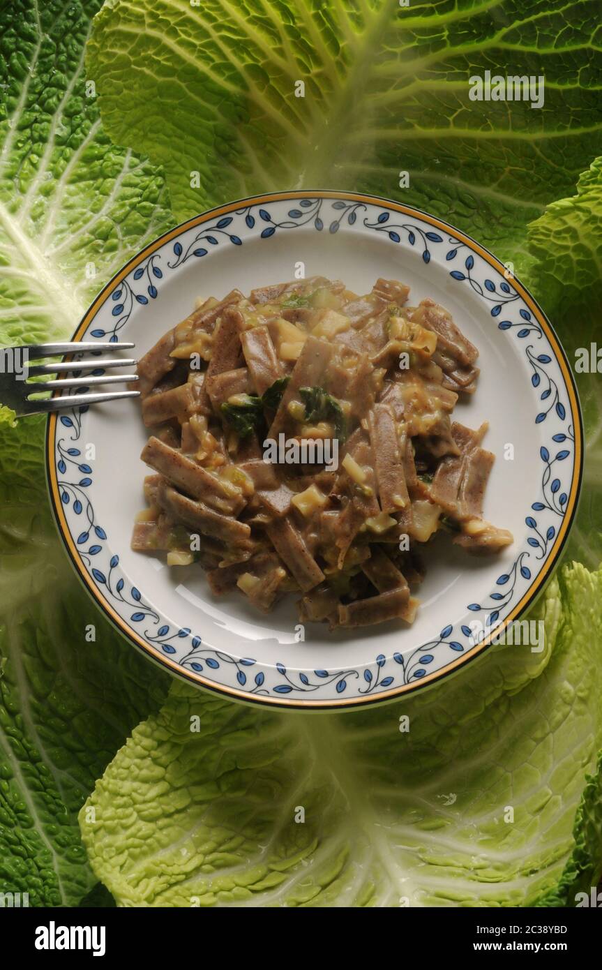 Pizzoccheri dish pasta with buckwheat Stock Photo - Alamy