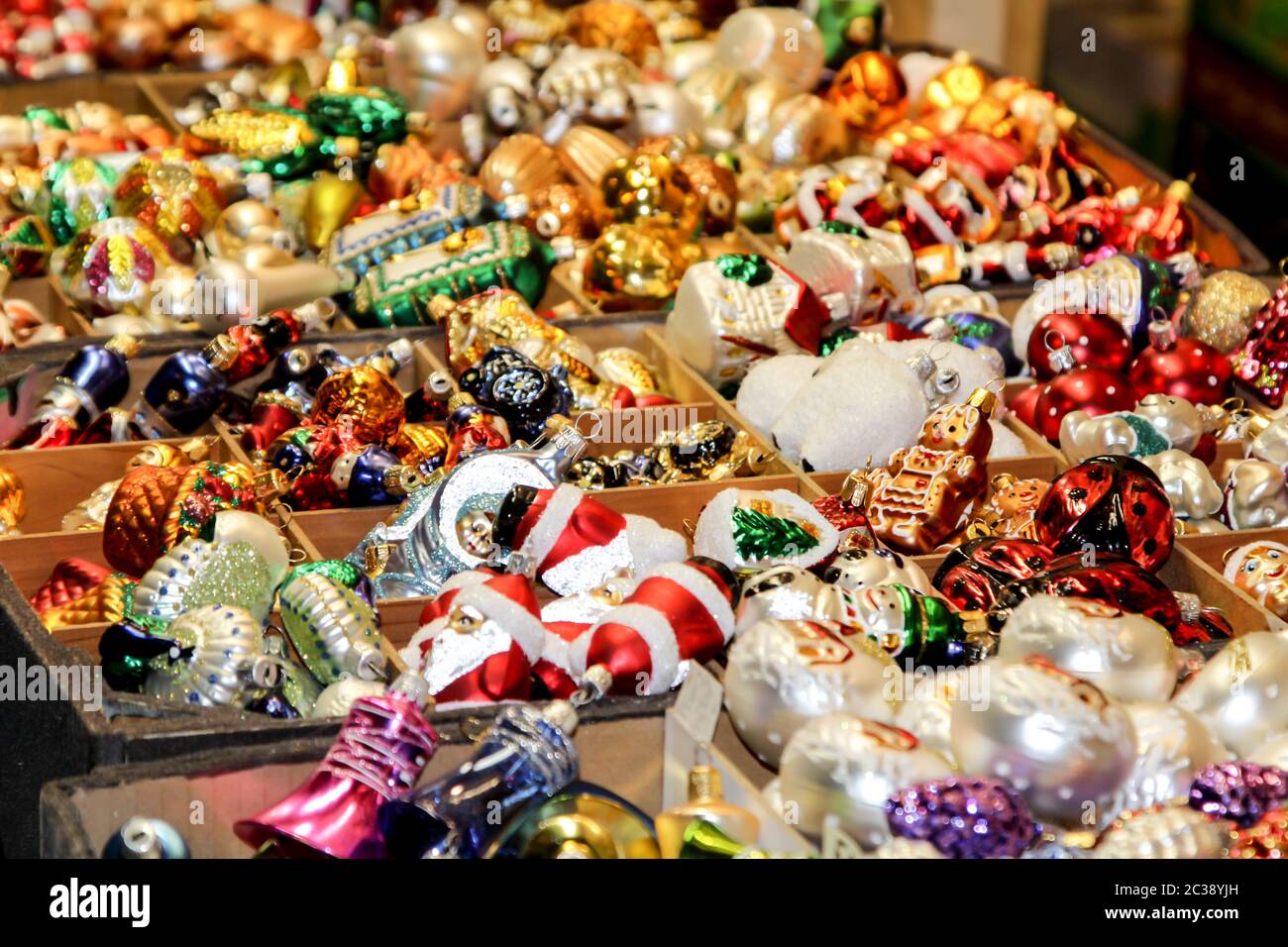 many bells and other Christmas tree decorations sorted into boxes Stock ...