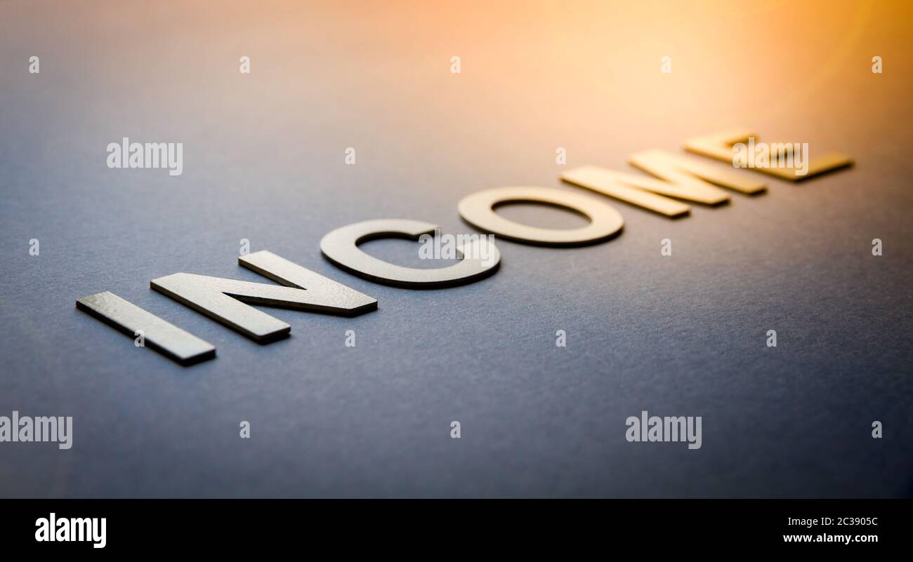 Word income written with white solid letters on a board Stock Photo - Alamy
