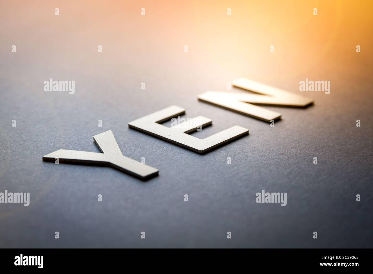 Word YEN written with white solid letters on a board Stock Photo - Alamy