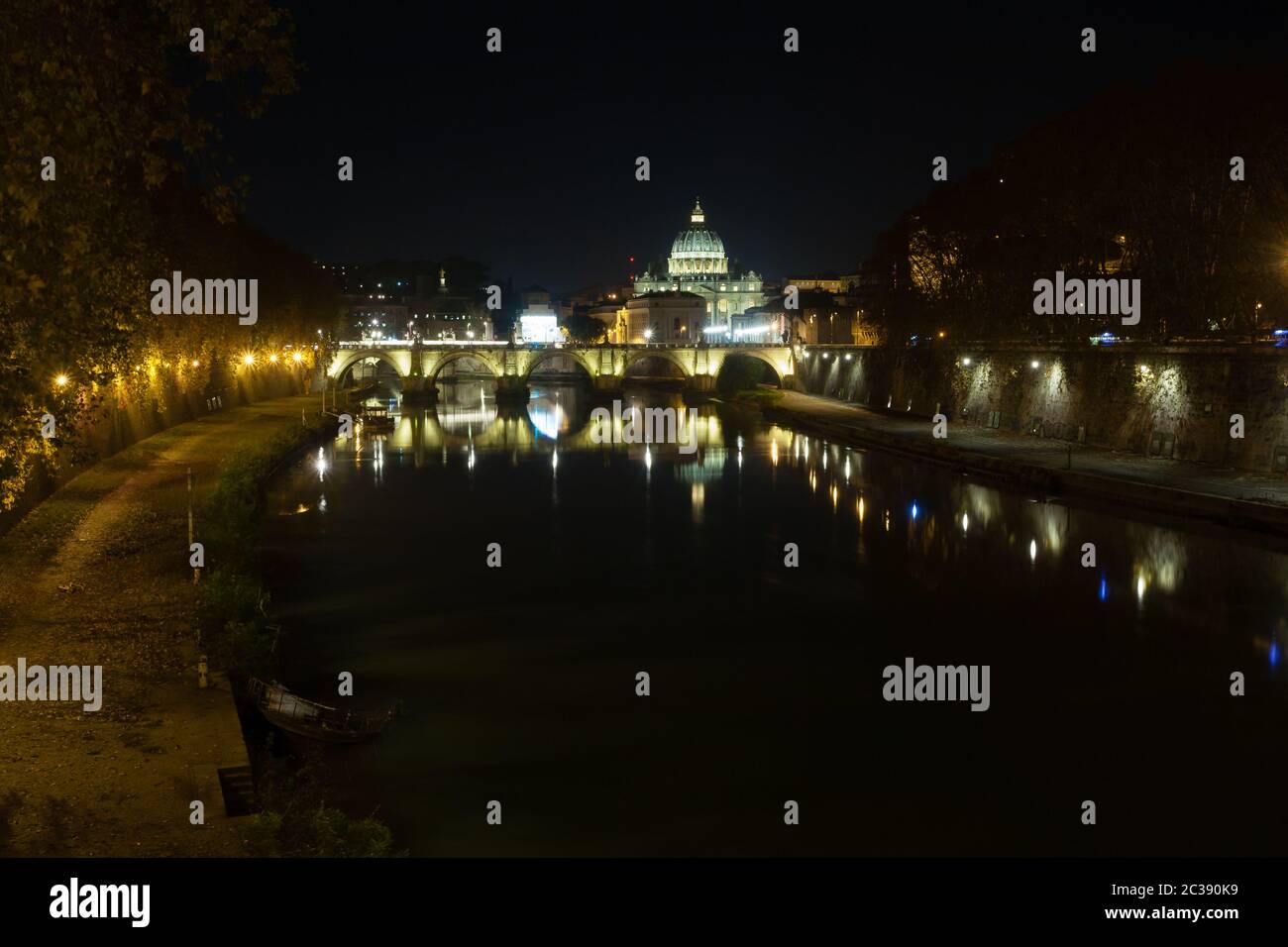 Night scene of Rome, Tevere river with Saint Peter basilica in ...