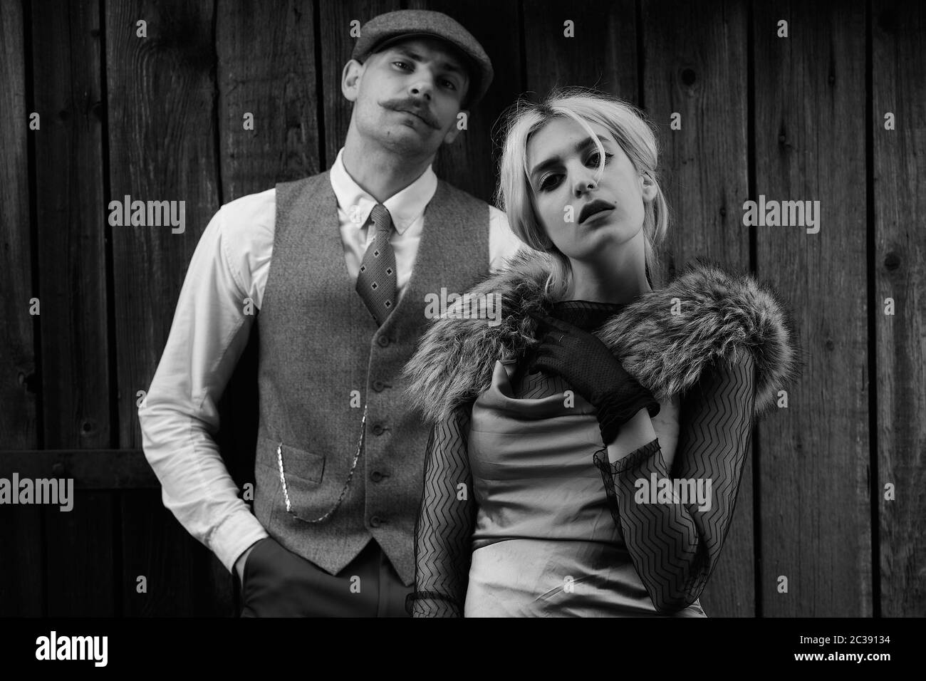 Portrait of a beautiful couple in vintage style. Retro style, classic ...