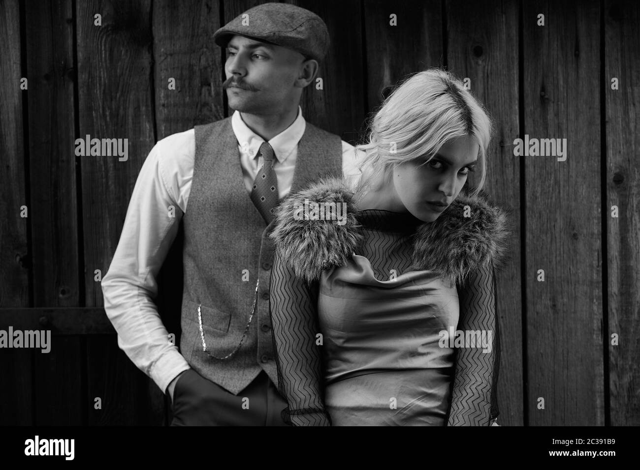 Portrait of a beautiful couple in vintage style. Retro style, classic ...