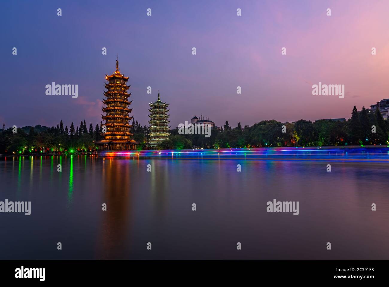 Sun and moon pagodas in Guilin at night Stock Photo - Alamy