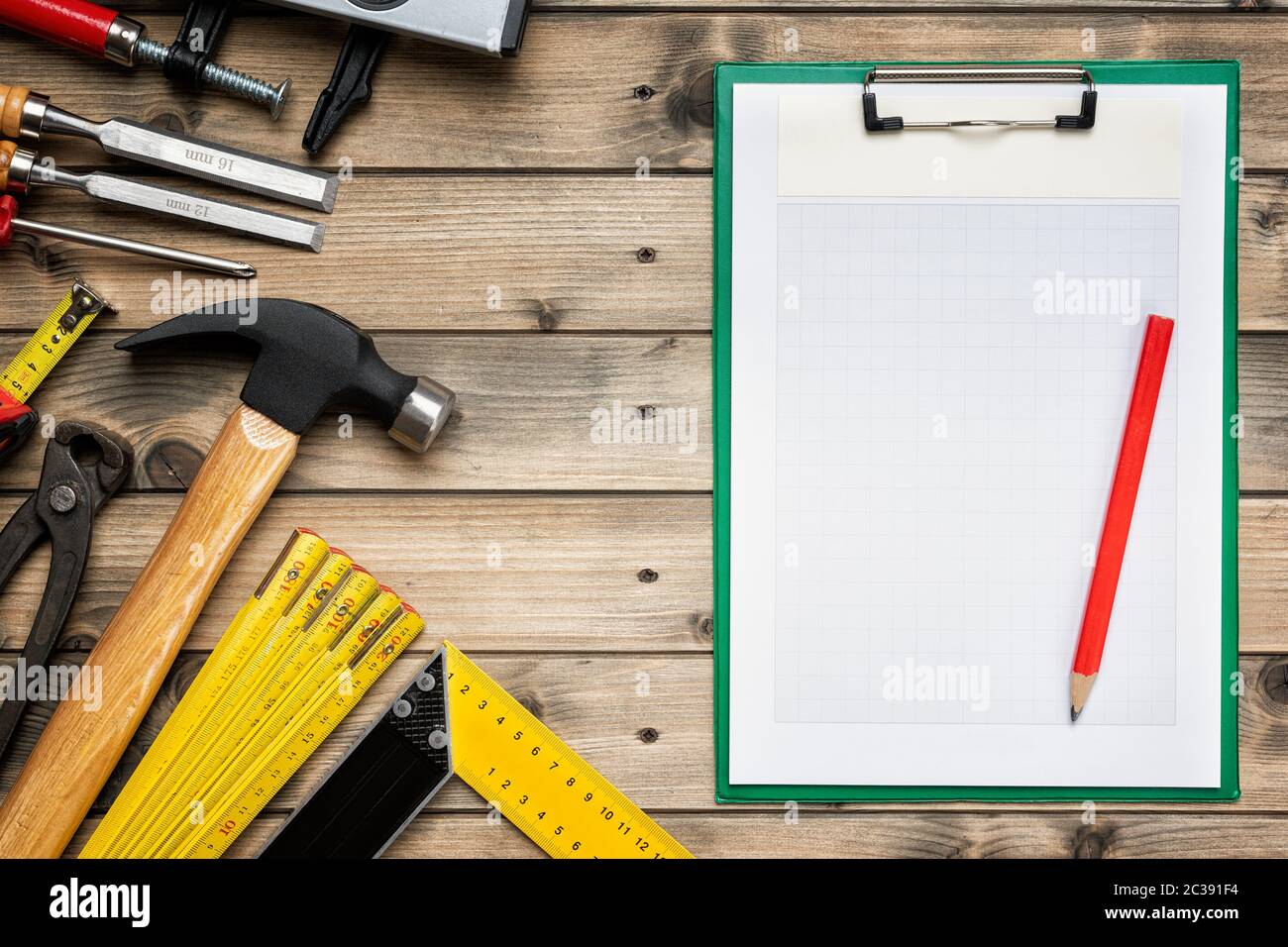 Top view to the carpenter's tools and notebook for notes on an antique ...