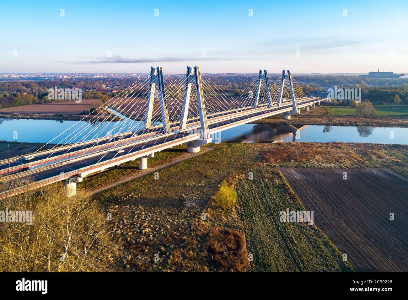 New modern double cable-stayed bridge with wide three-lane roads over ...
