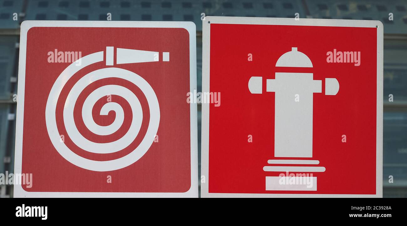 fire hose and fire hydrant signs for fire fighters Stock Photo - Alamy
