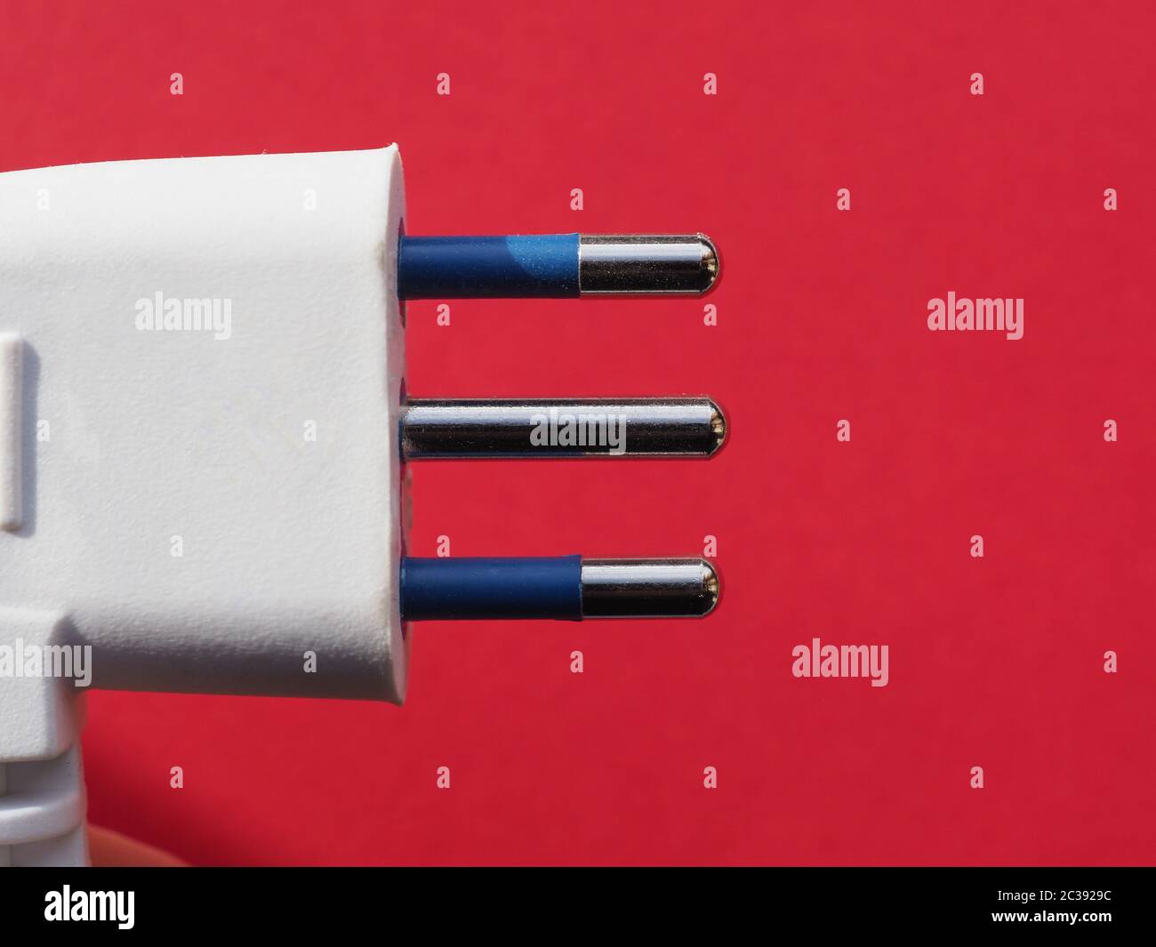 three pole round pin italian plug for electric power Stock Photo - Alamy