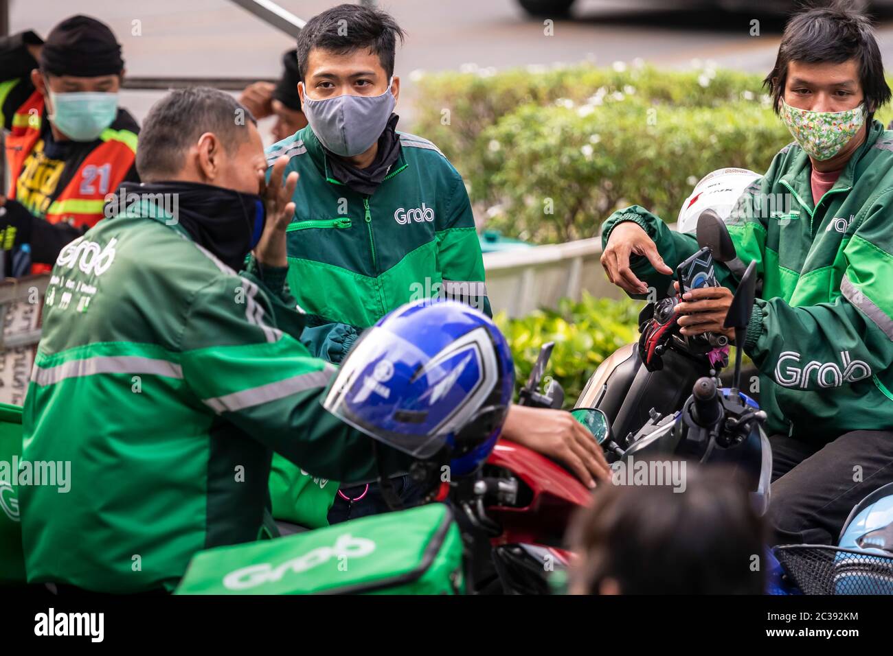 Grab motorcycle riders with face mask during Covid 19 pandemic, Bangkok ...