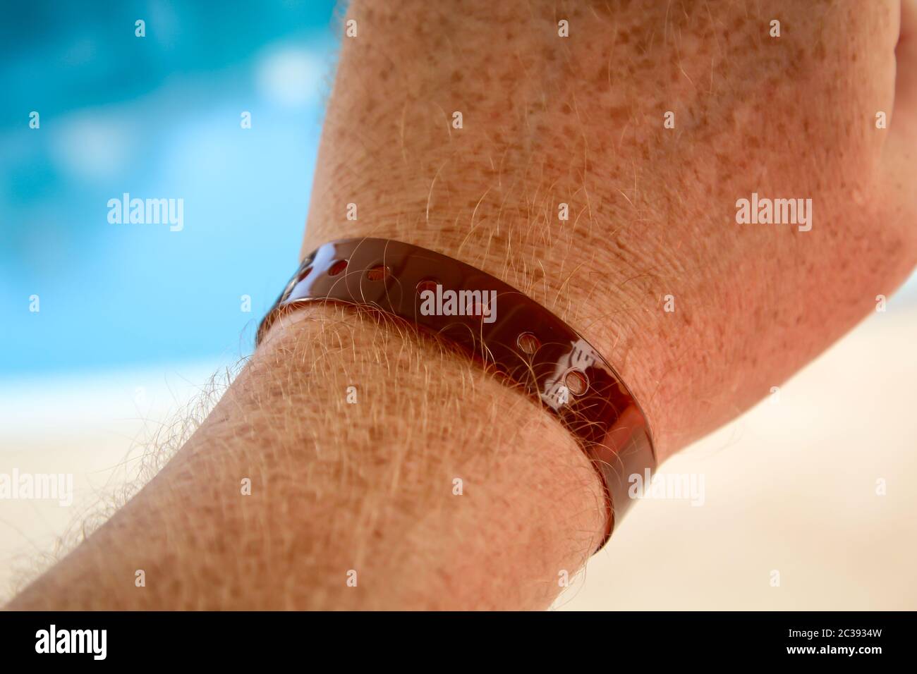 a VIP band or a band for all inclusive on one wrist Stock Photo - Alamy