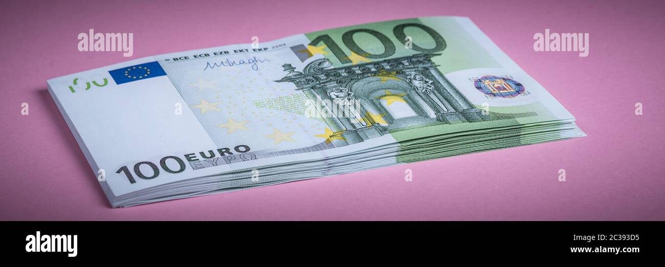Euro cash on a lilac, purple and pink background. Euro Money Banknotes ...