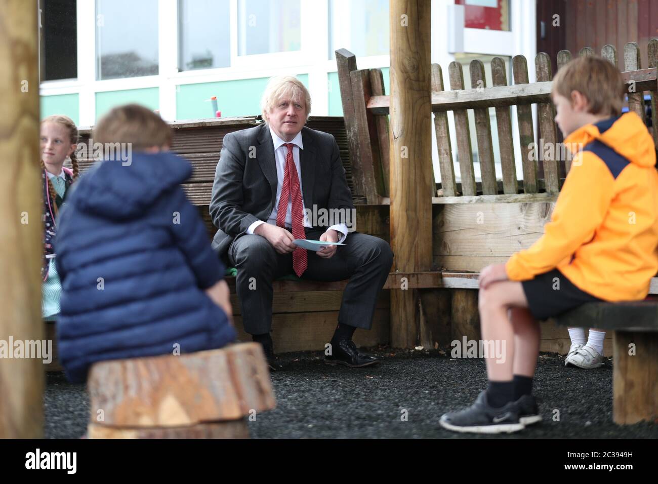 Prime Minister Boris Johnson joins a socially distanced lesson during a ...