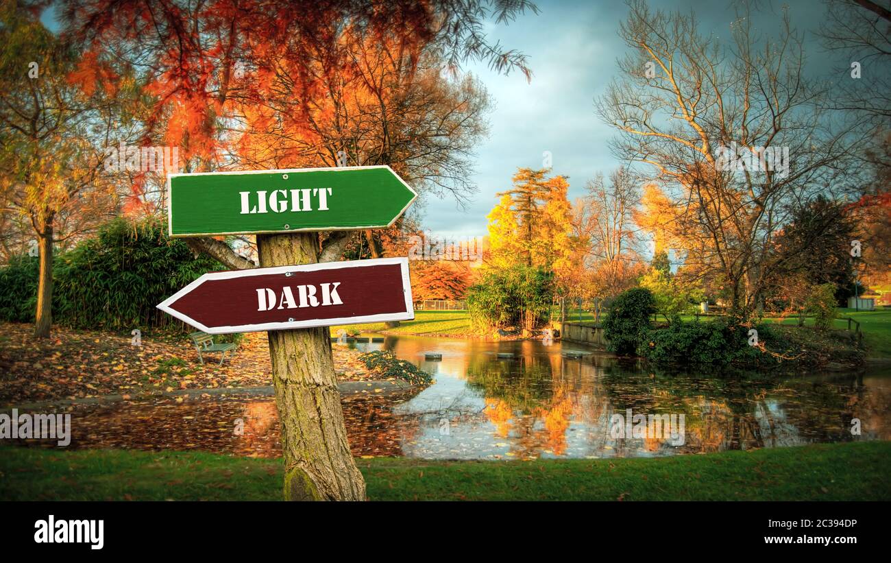 Street Sign Light versus Dark Stock Photo - Alamy