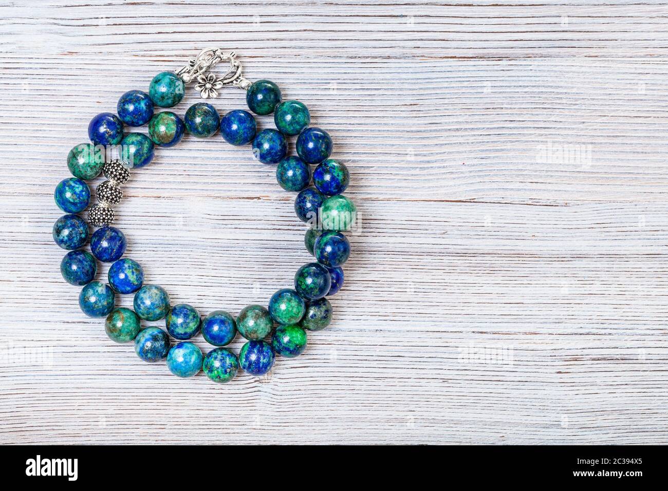 needlecraft background - handcrafted necklace from polished azurite ...