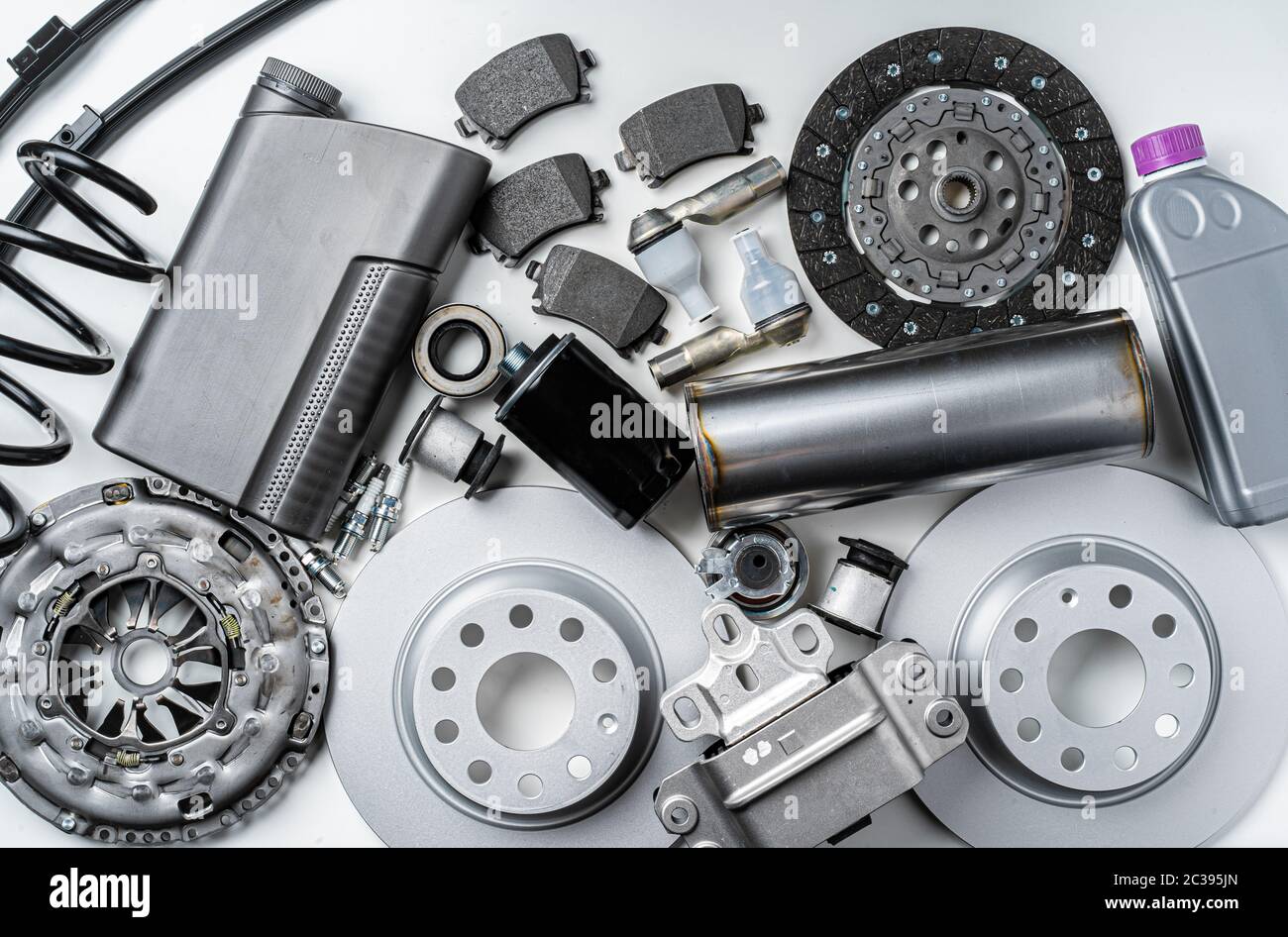 New metal auto parts on grey background Stock Photo - Alamy