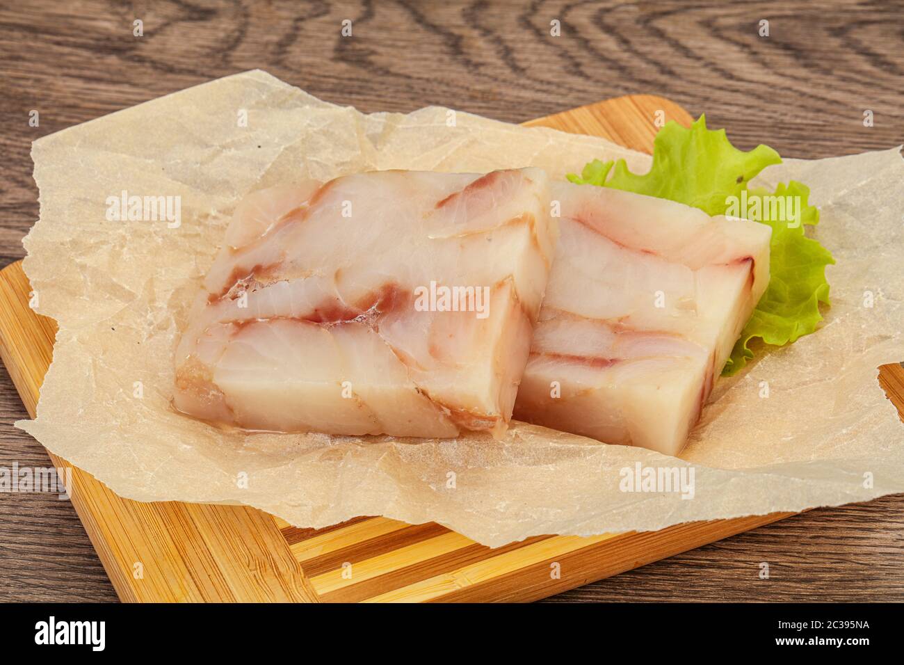 Raw dietary pollock fish fillet for cooking Stock Photo - Alamy
