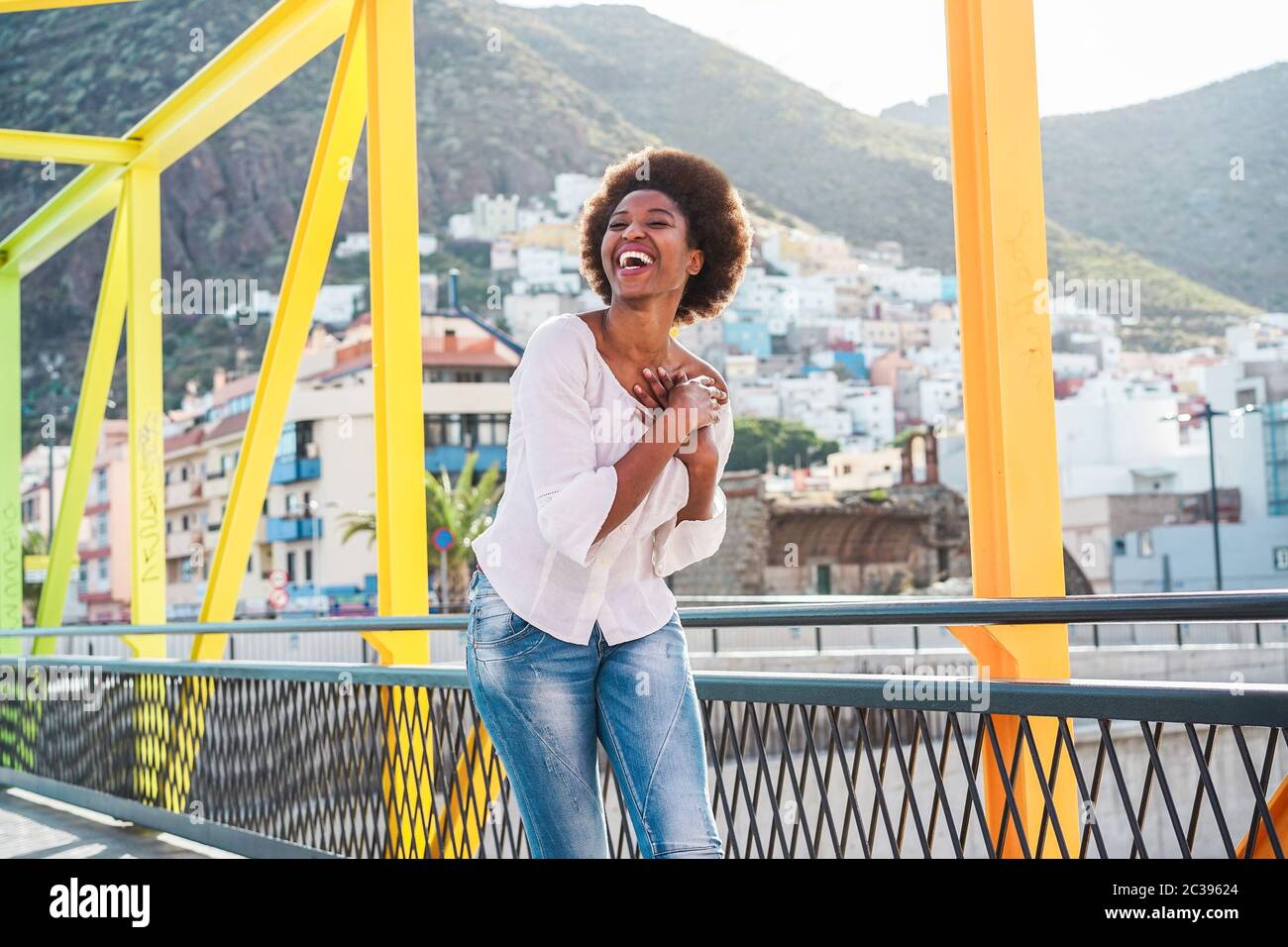 African woman having fun walking around the city outdoor - Afro girl ...