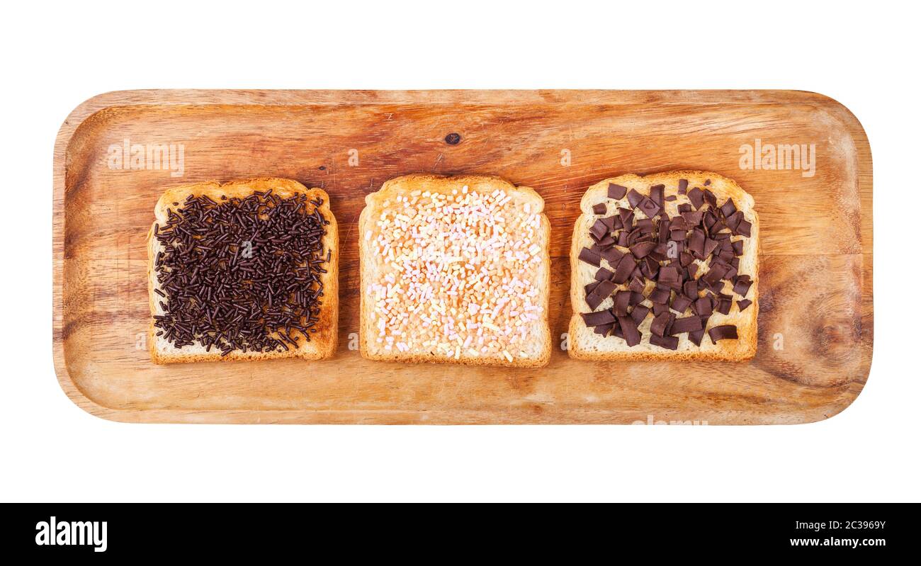 top view of various dutch sweet open sandwich with toast and toppings ...